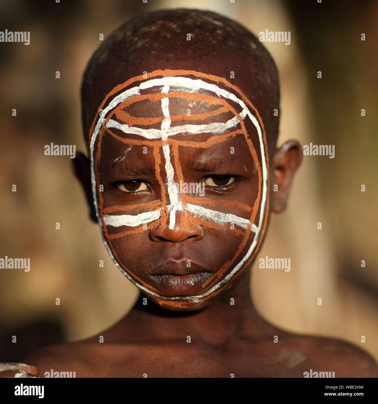 Young tribal Suri boy at a ceremony in Lower Omo Valley near Kibish ...