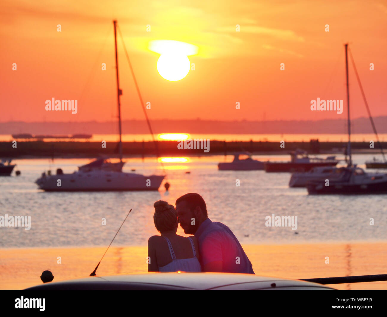 Queenborough, Kent, UK. 26th August, 2019. UK Weather: a red hot sunset ...