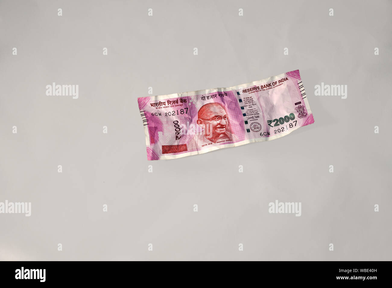 wrinkled modern Indian Two Thousand Rupees Currency Note on a minimal ...