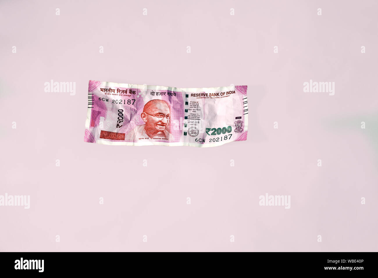 wrinkled modern Indian Two Thousand Rupees Currency Note on a minimal ...