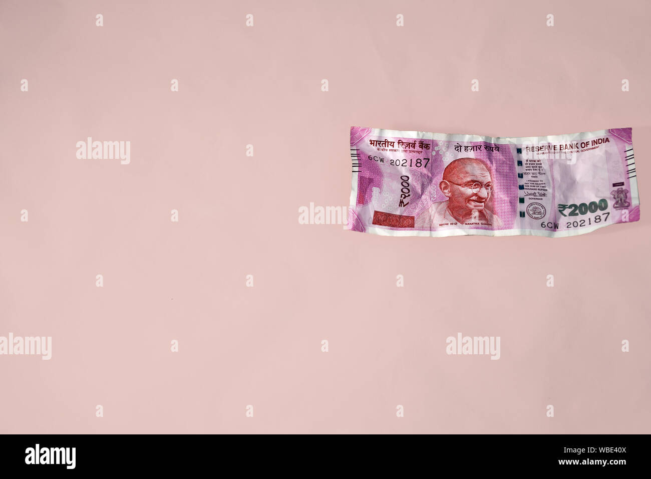wrinkled modern Indian Two Thousand Rupees Currency Note on a minimal ...