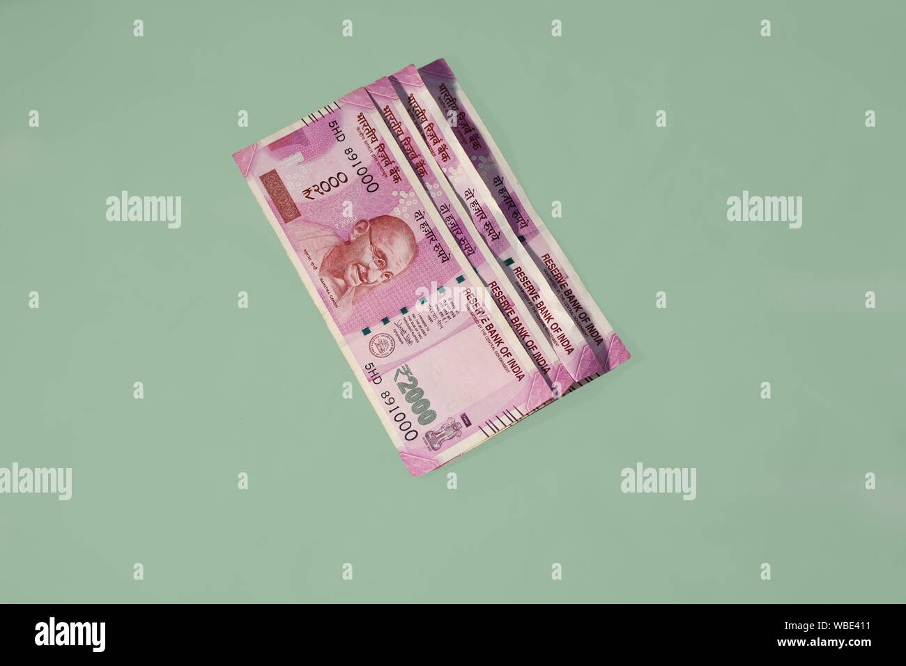 Modern Indian Two Thousand Rupees Currency Note on a minimal green ...