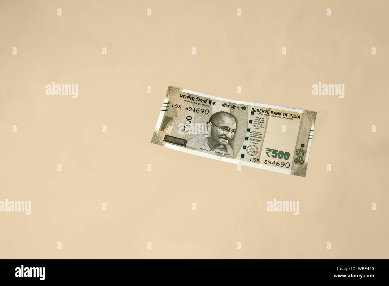 Modern Indian Five Hundred Rupees Currency Note on a minimal green ...