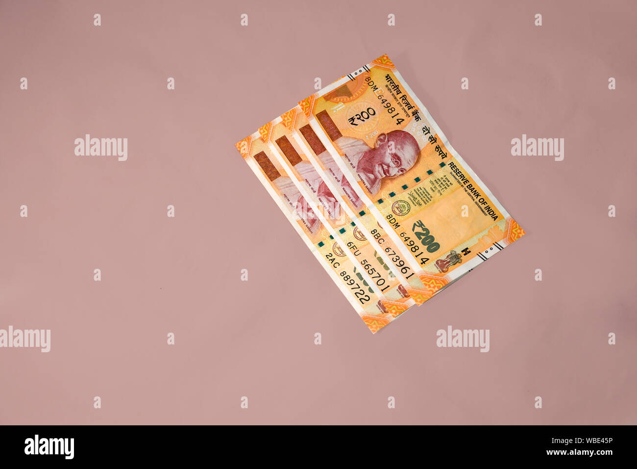 Modern Indian Two Hundred Rupees Currency Notes on a minimal brown ...