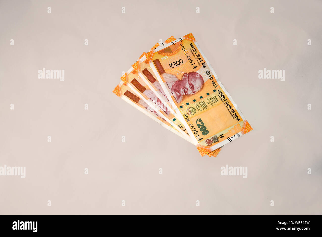 Modern Indian Two Hundred Rupees Currency Notes on a minimal cream ...