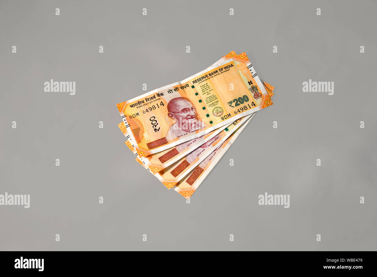 Modern Indian Two Hundred Rupees Currency Notes on a minimal grey ...