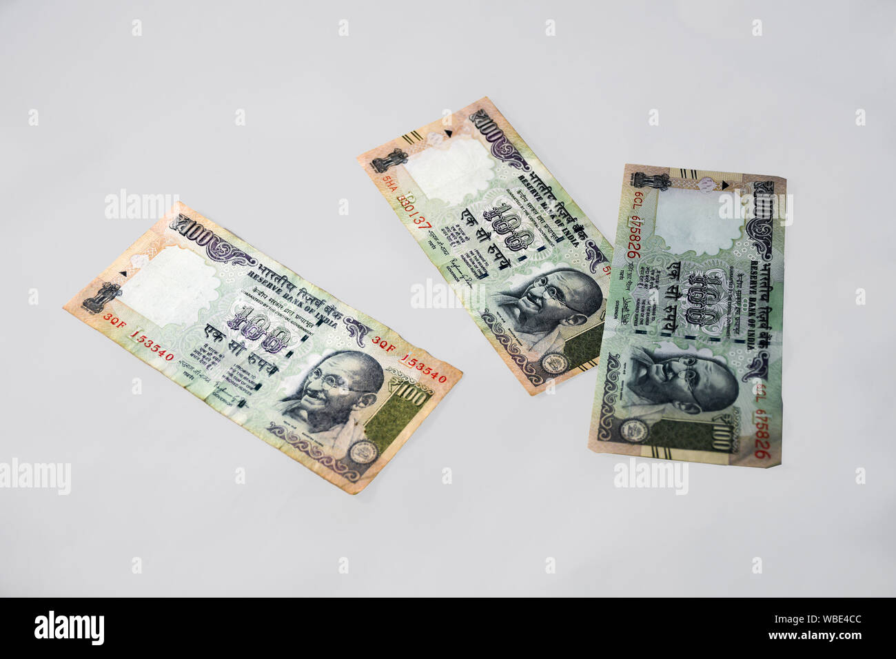 Wrinkled & used old Indian One Hundred Rupees Currency Notes on a ...