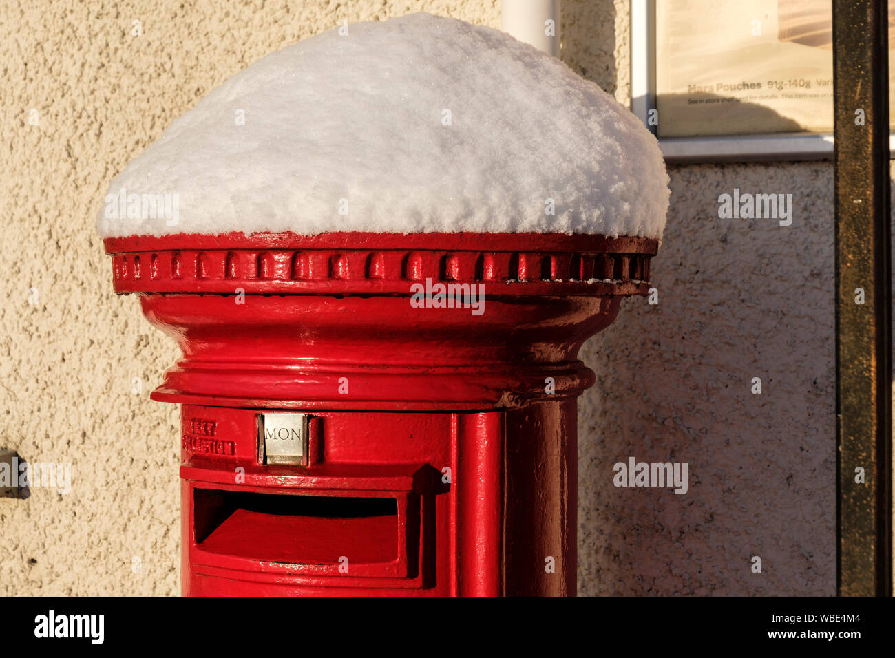 Snow covered post box outside village shop & Post Office, Main Street ...