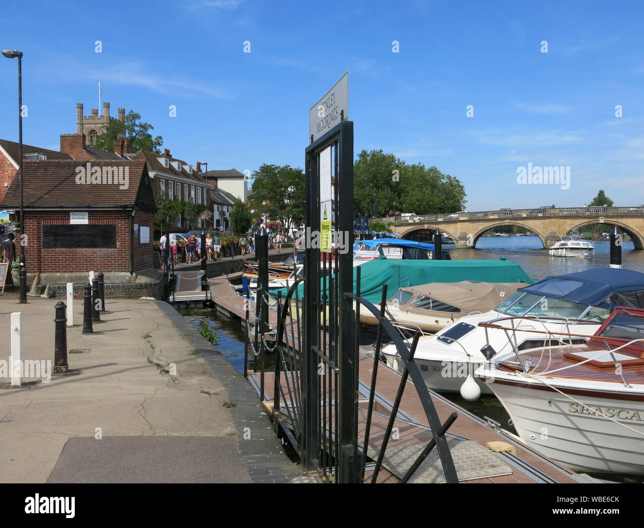 View of the riverside at Henley-on-Thames on a summer's day with lots ...