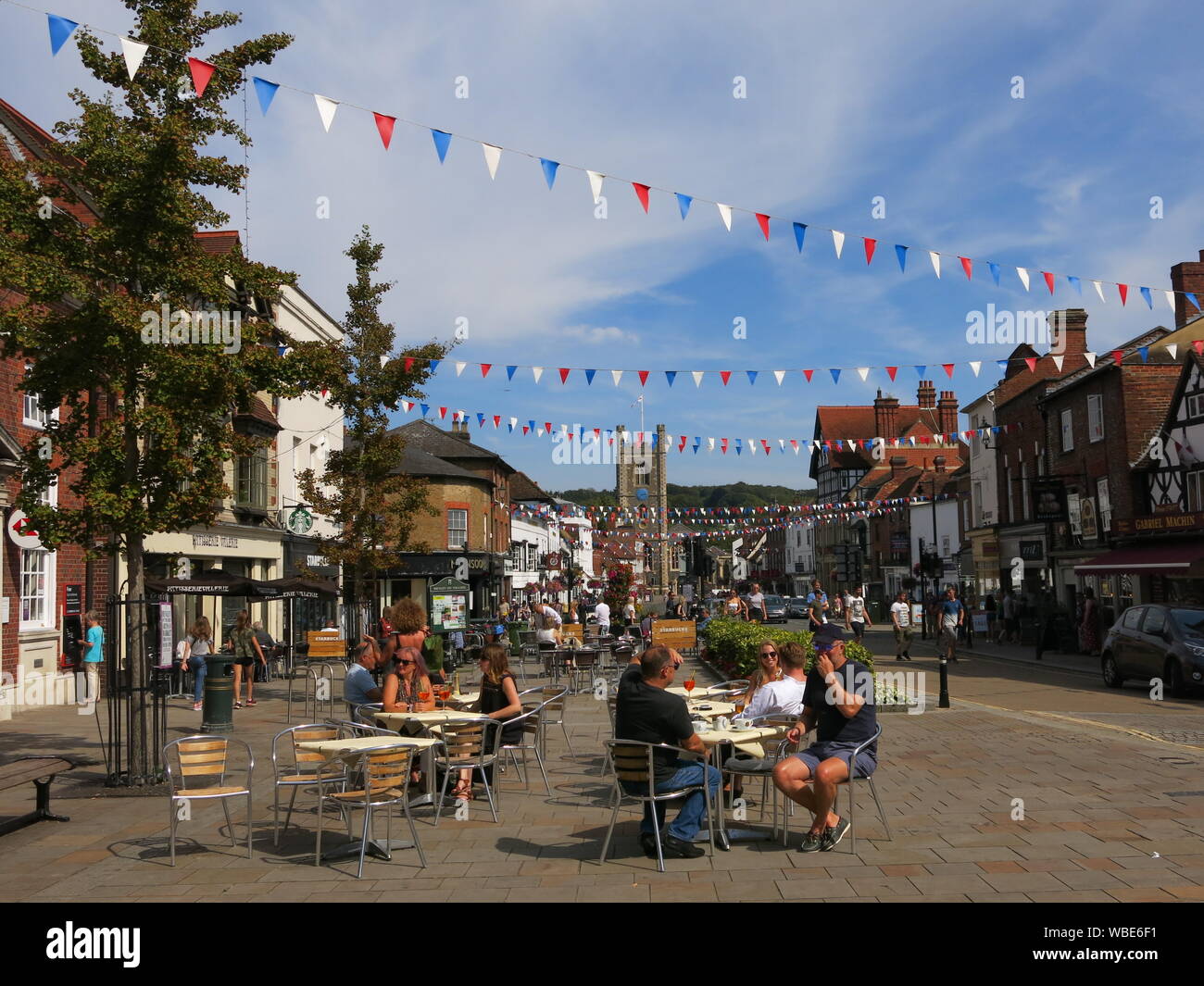 Market Place in Henley on a summer's day with bunting across the street ...
