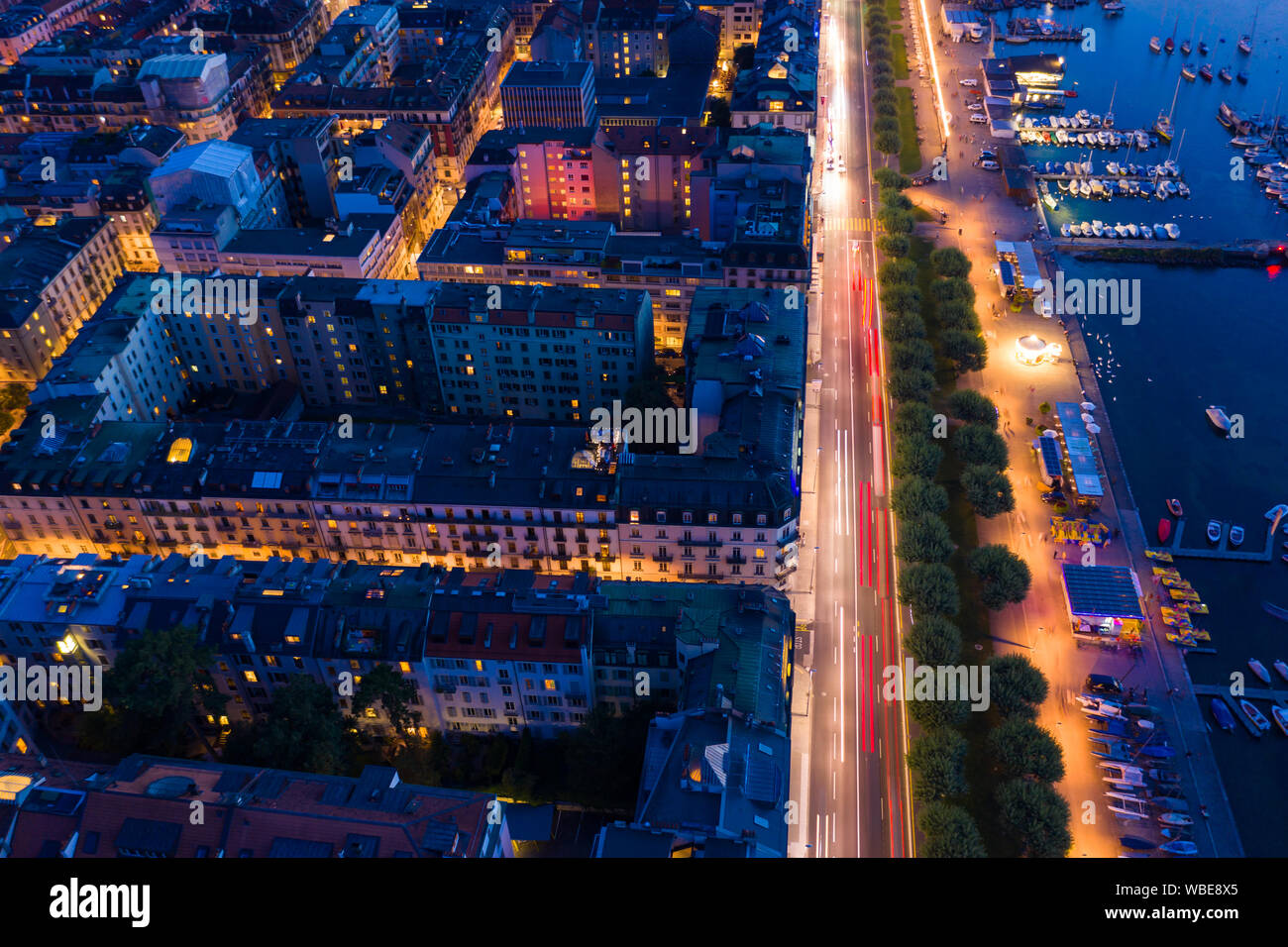 Aerial night view of Geneva city waterfront skyline in Switzerland ...