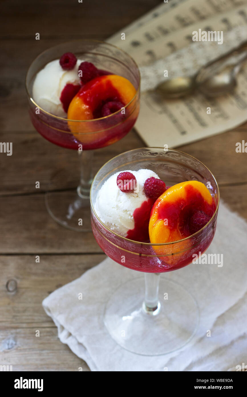 Ice cream, peach and raspberry sauce dessert dedicated to Australian ...