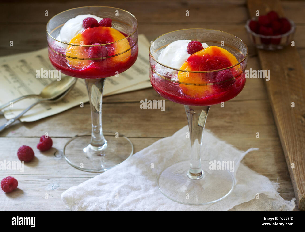 Ice cream, peach and raspberry sauce dessert dedicated to Australian ...