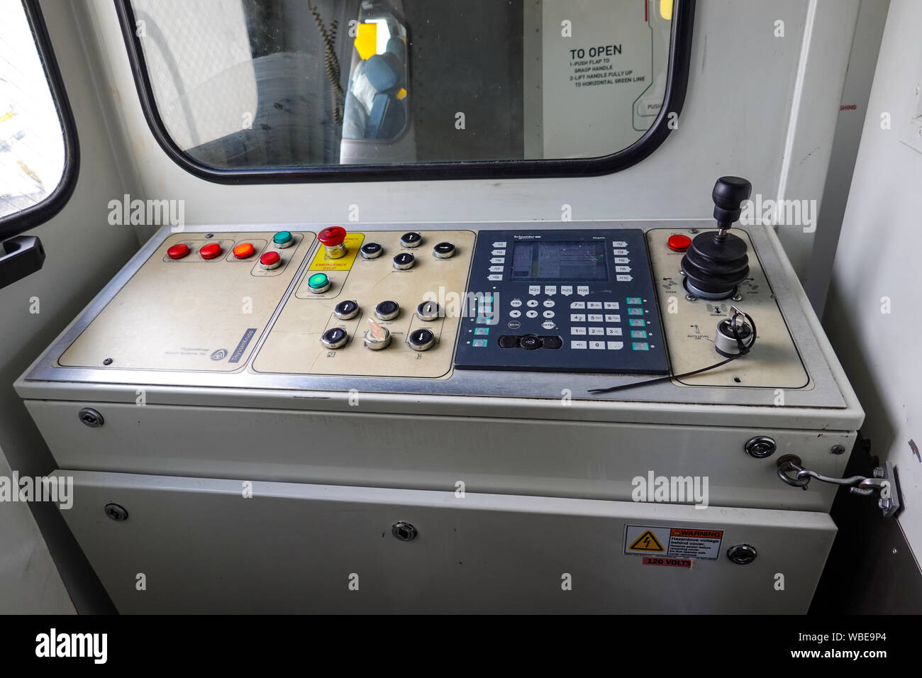 Orlando, FL/USA-8/22/19: The control panel to move the jetway out to ...