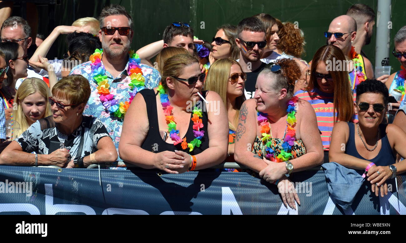 Crowd watching the Manchester, uk, LGBT Pride Parade on 24th August ...