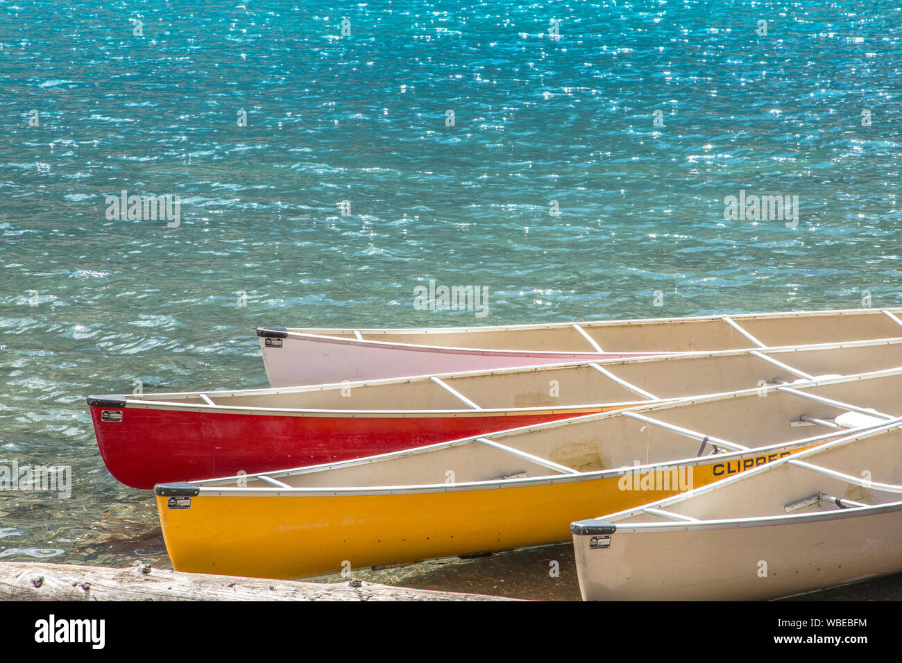 Kayaks at glacier blue lakes in Banff, Canada Stock Photo - Alamy