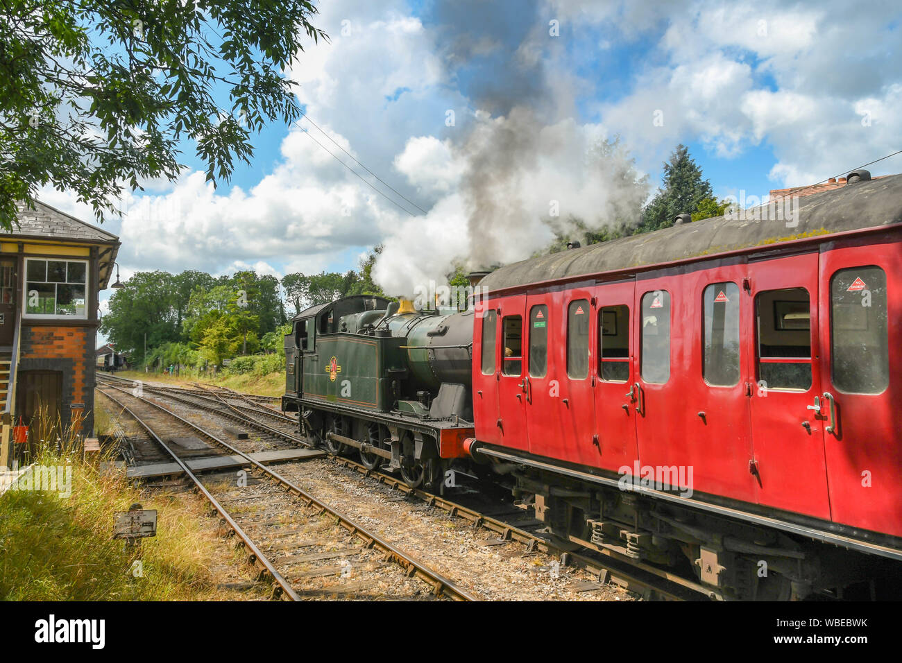 CRANMORE, ENGLAND - JULY 2019: Steam engine pulling a train departing ...