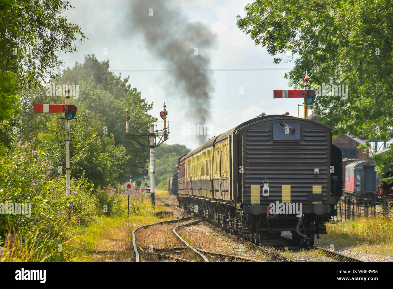 CRANMORE, ENGLAND - JULY 2019: Steam engine pulling a train departing ...
