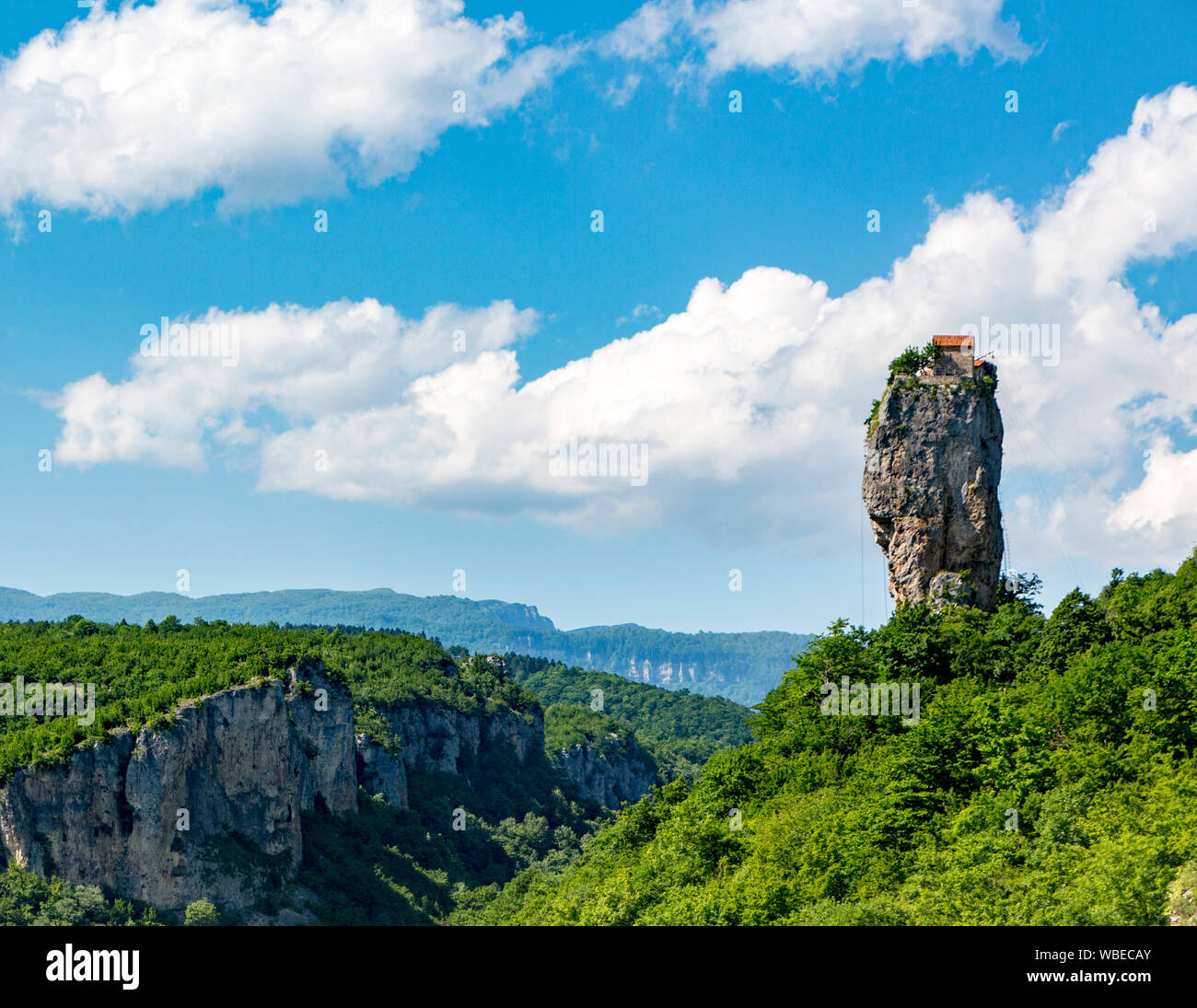 Katskhi Pillar is a single 120 foot tall towering pillar of rock with a ...