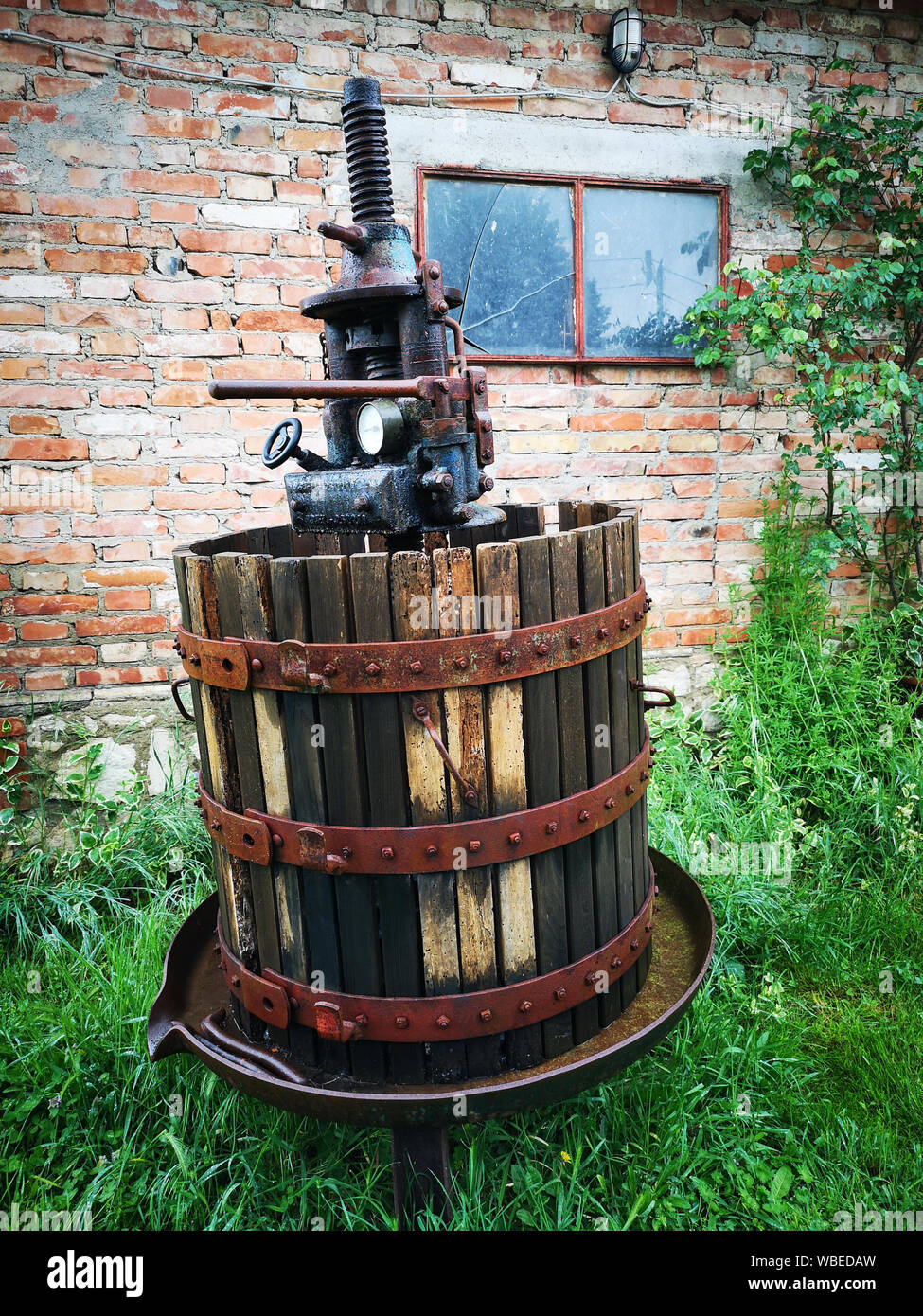 Antique grape press hi-res stock photography and images - Alamy