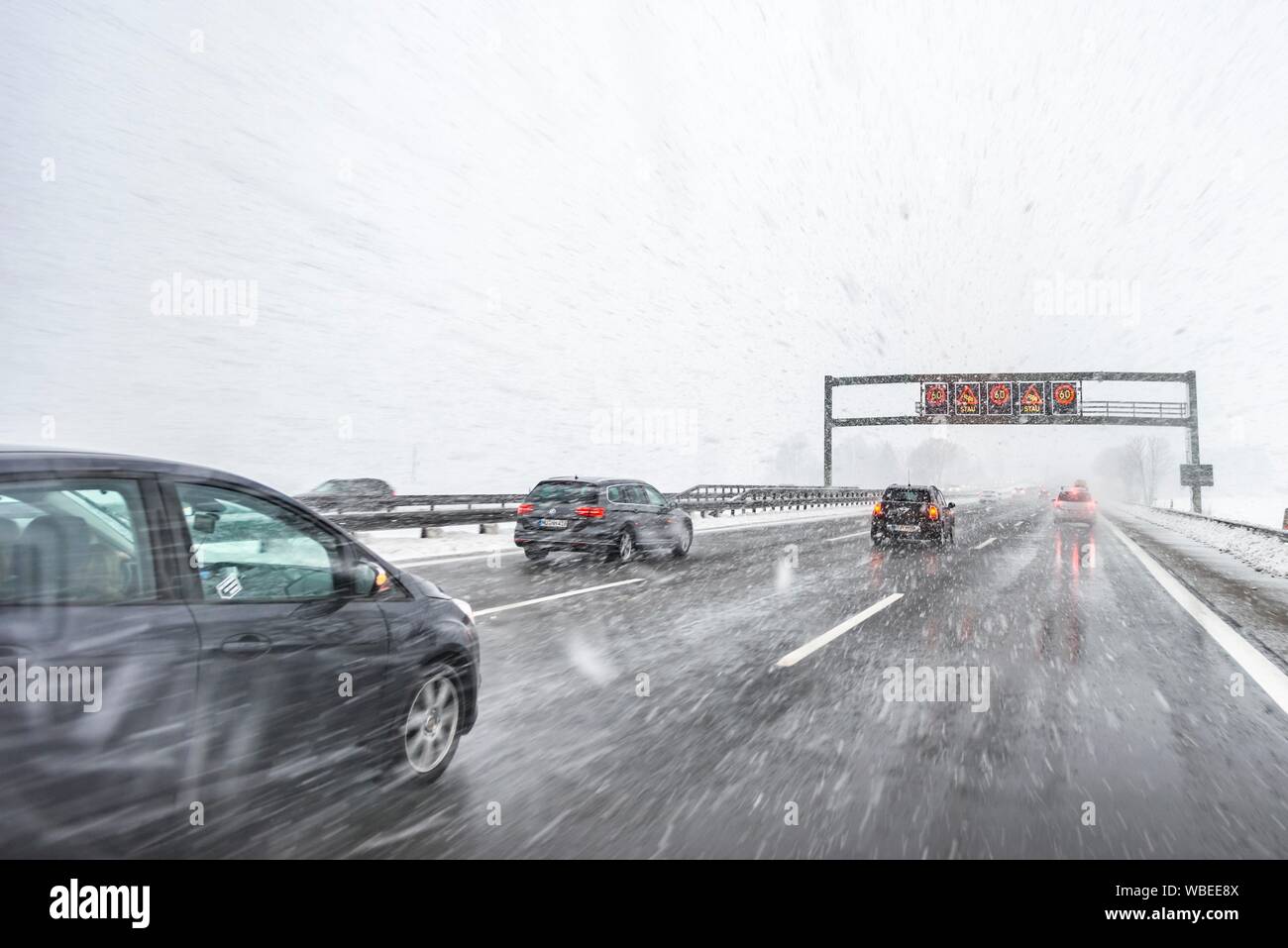 Danger of traffic jams and speed limits, bad weather, car traffic ...