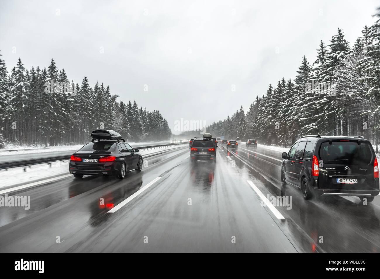 Heavy traffic during heavy snowfall rain on the a8 motorway hi-res ...