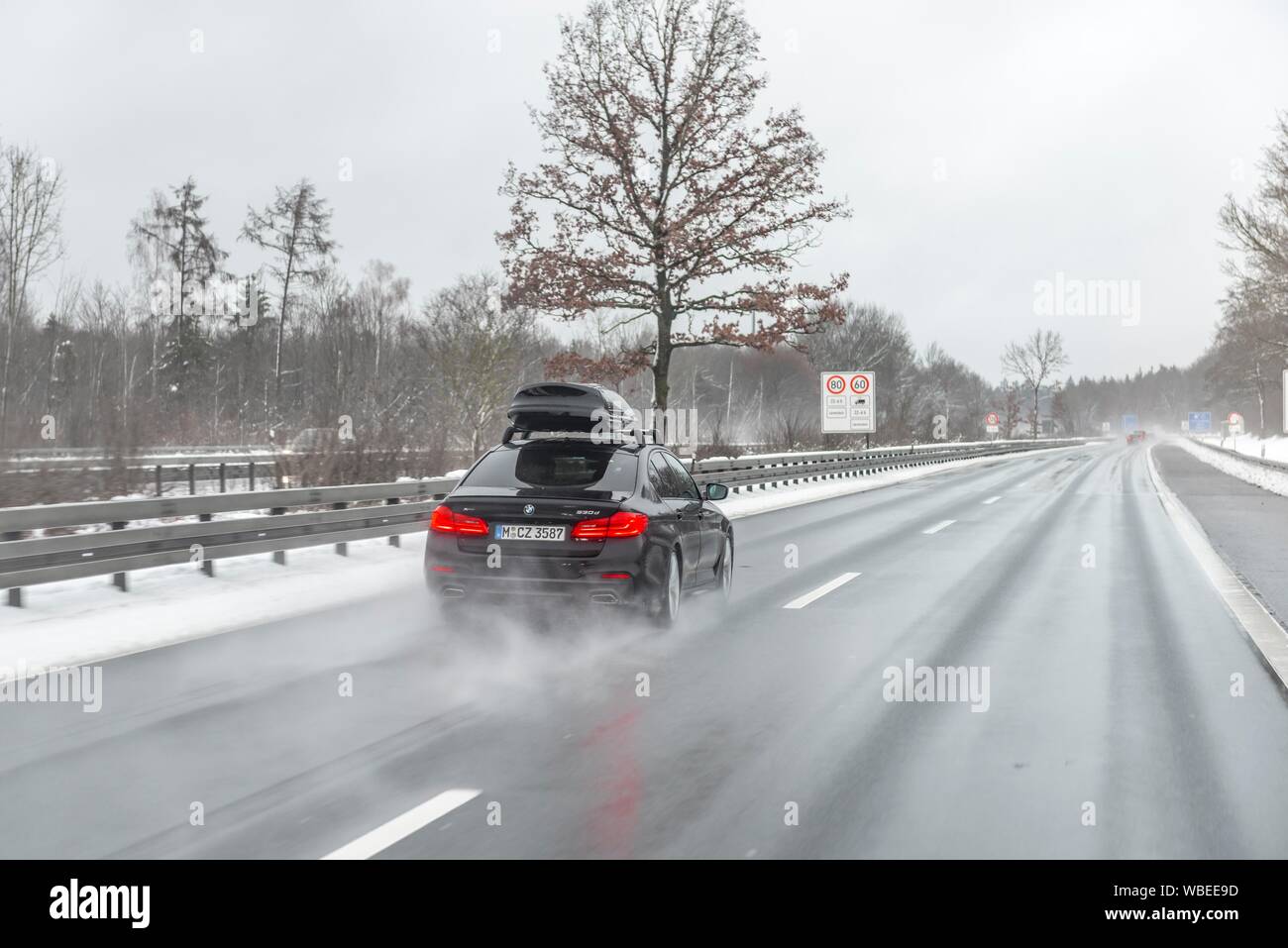 Heavy traffic during heavy snowfall rain on the a8 motorway hi-res ...