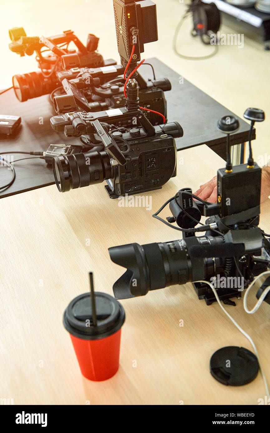 Behind the scenes of filming movies and video products, setting up ...