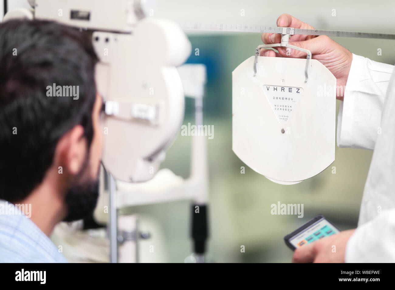 Patient in modern ophthalmology clinic checking the eye vision Stock ...
