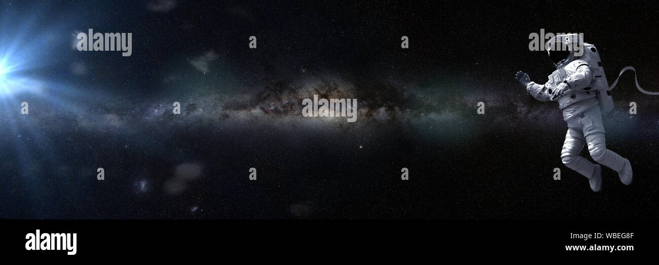 astronaut in empty space in front of the Milky Way galaxy Stock Photo ...