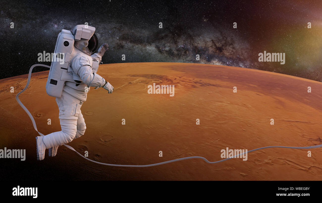 astronaut during a space walk above the surface of planet Mars Stock ...