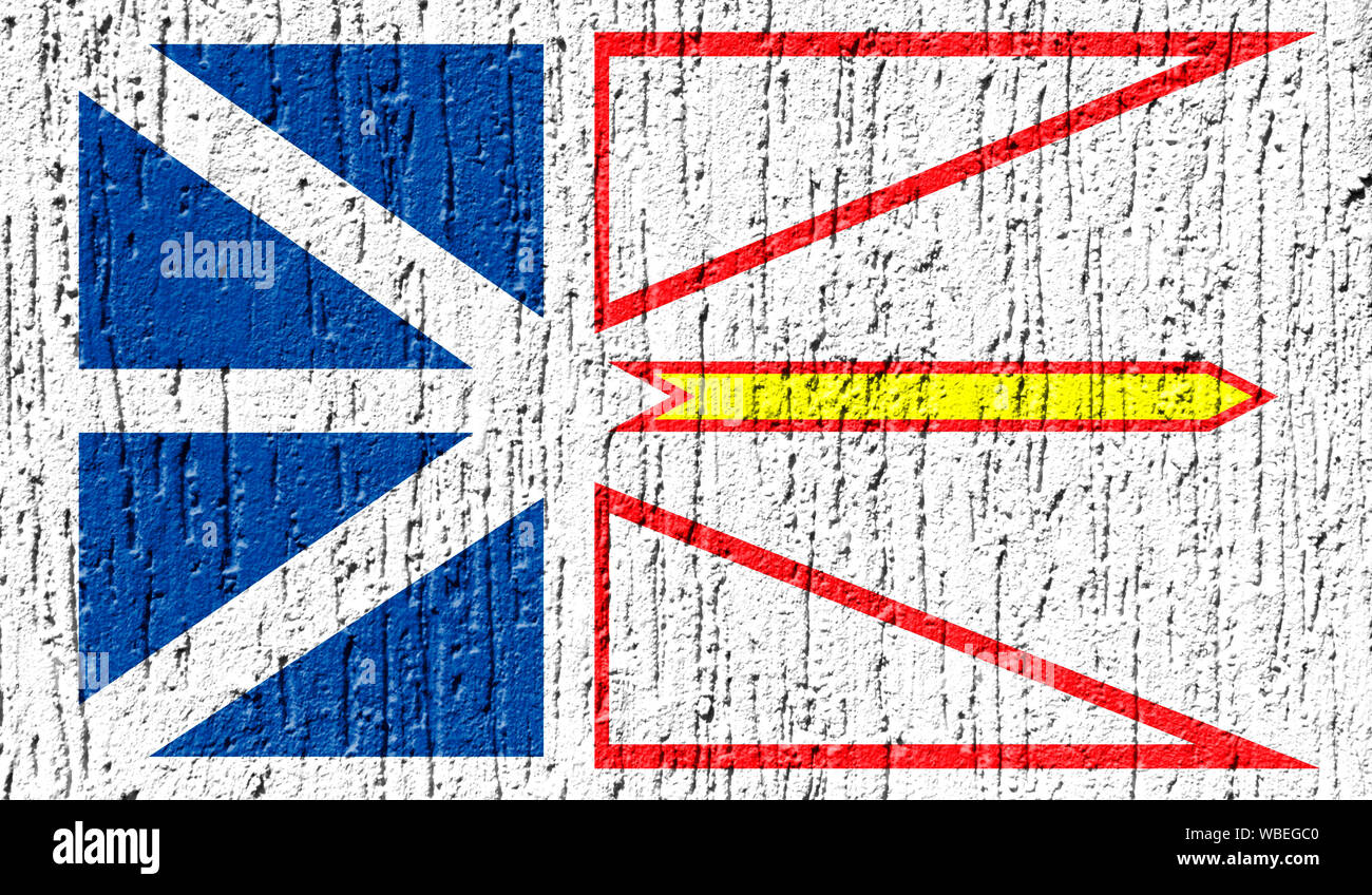 Flag of Newfoundland and Labrador close up painted on a cracked wall ...