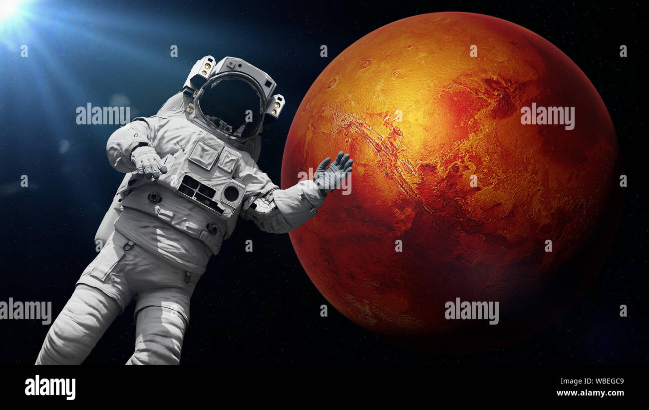 astronaut waving during a space walk in orbit of planet Mars Stock ...