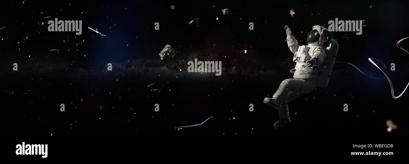 astronaut hit by space debris in orbit of planet Earth Stock Photo - Alamy
