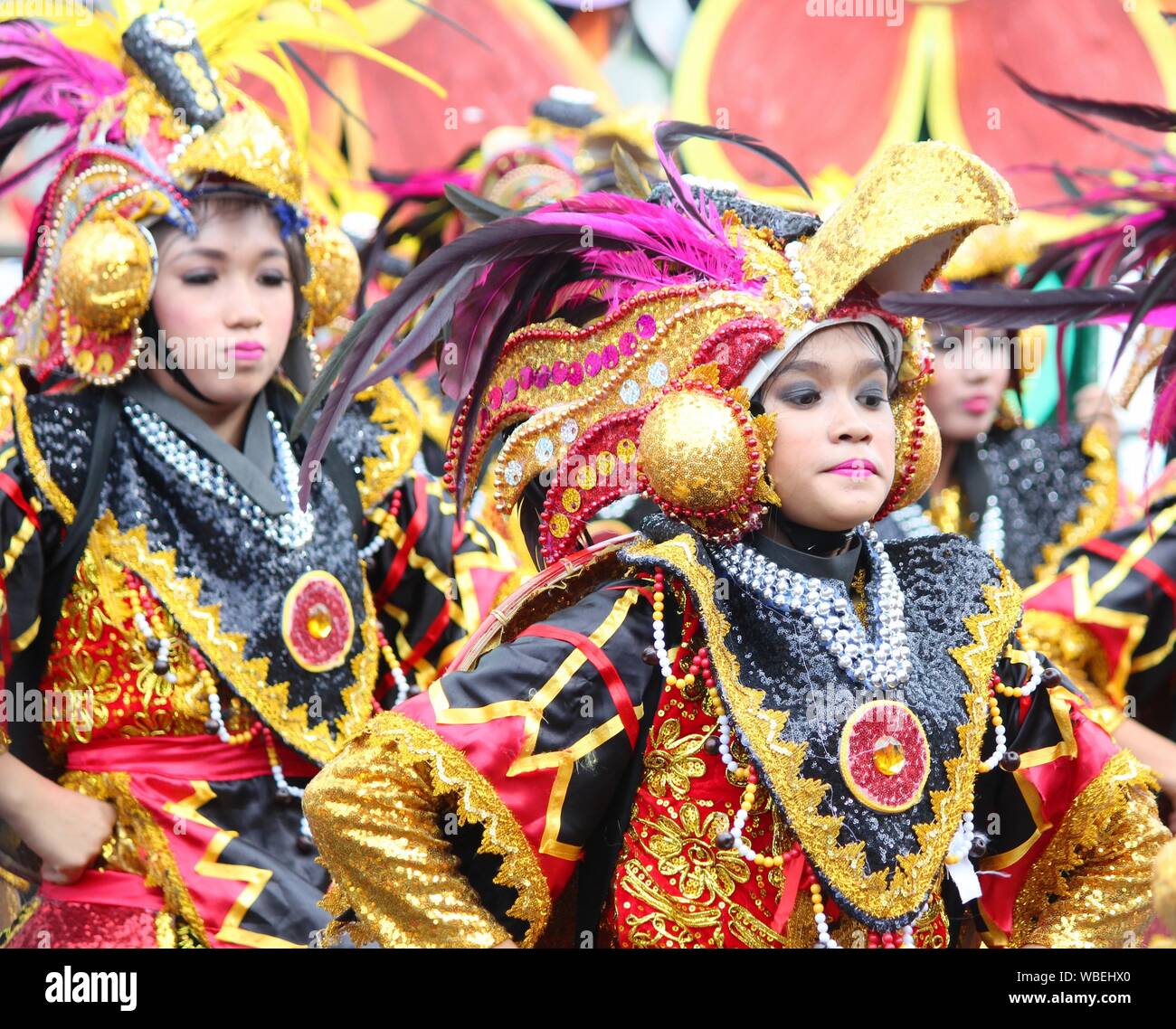 Davao City, Philippines-August 2014: Participants in colorful costumes ...