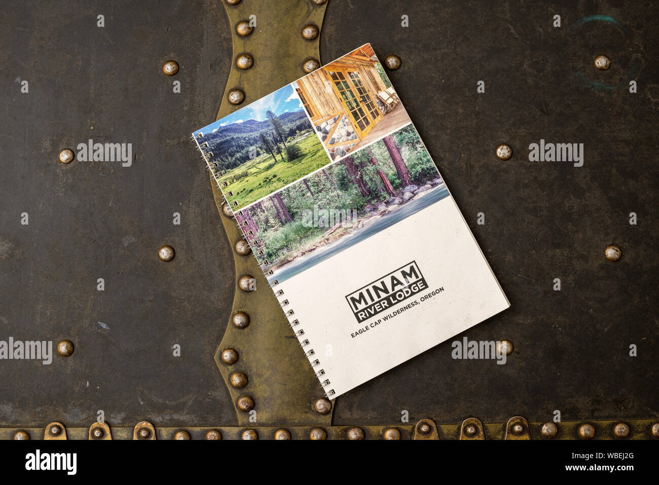 Minam River Lodge guidebook on a chest at the Minam River Lodge in ...