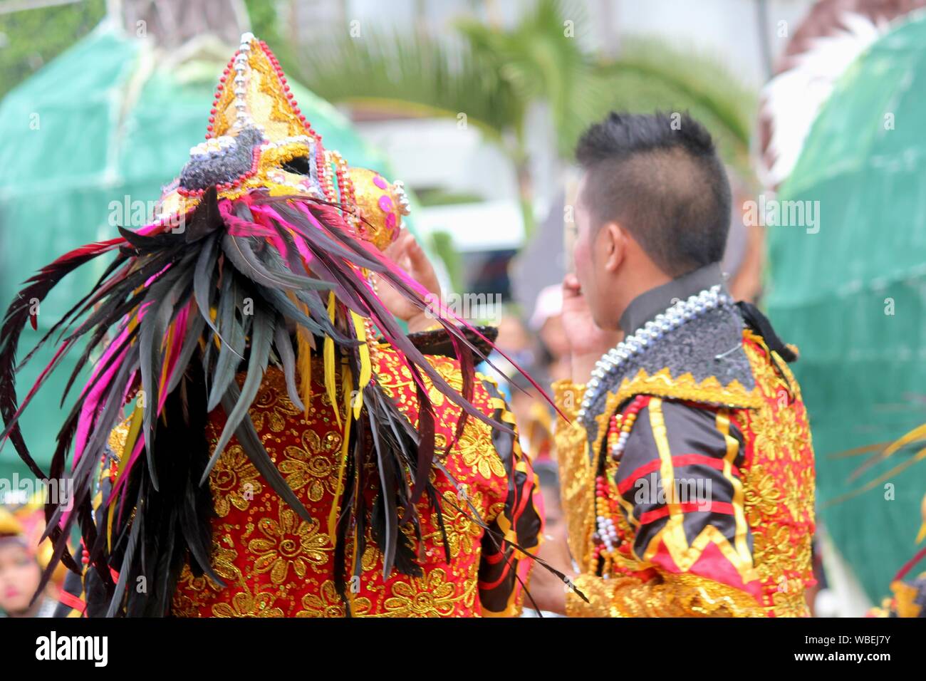 Davao City, Philippines-August 2014: Back view of a colorful headress ...
