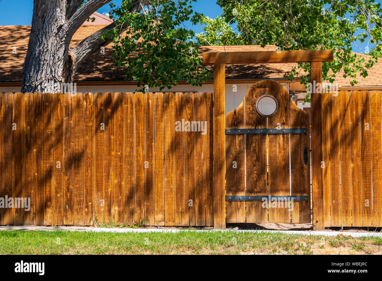 Sunlight & shadows; wooden slat fence & gate; Salida; Colorado; USA ...