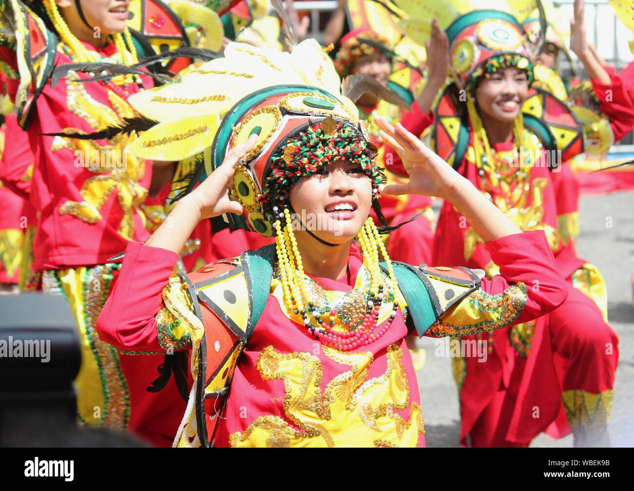 Davao City, Philippines-August 2014: Streetdancers in colorful costumes ...