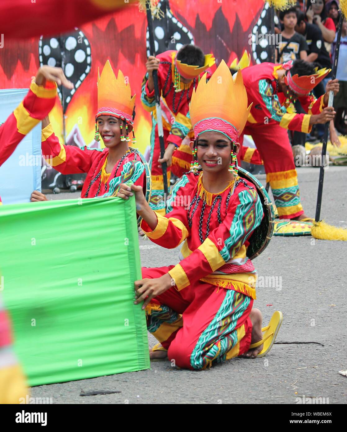 Davao City, Philippines-August 2014: Streetdancers in colorful costumes ... Davao City, Philippines-August 2014: Streetdancers in colorful costumes ...