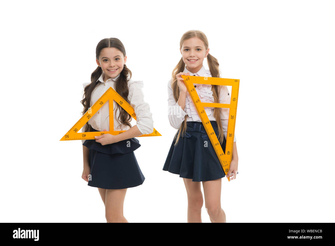 A lesson is learnt. Small children with measuring instruments at school ...