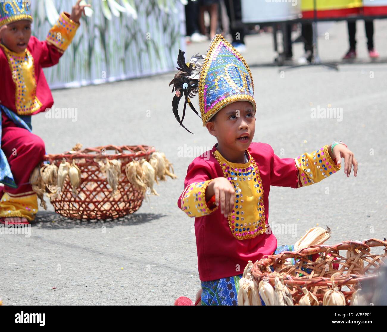 Davao City, Philippines-August 2014: Performers dance in the streets at ...