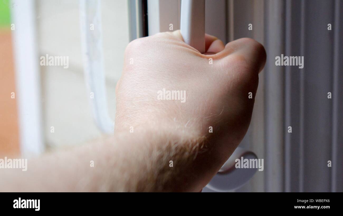 Pulling on door handle hi-res stock photography and images - Alamy