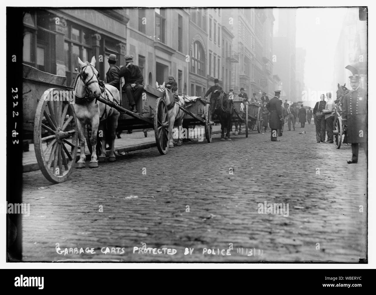 Garbage carts protected Black and White Stock Photos & Images - Alamy