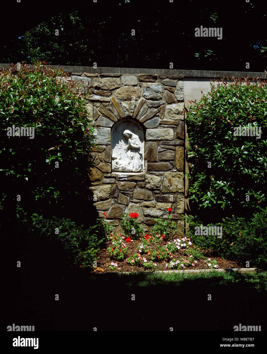 Garden and small statue at the Apostolic Nunciature of the Holy See, or ...