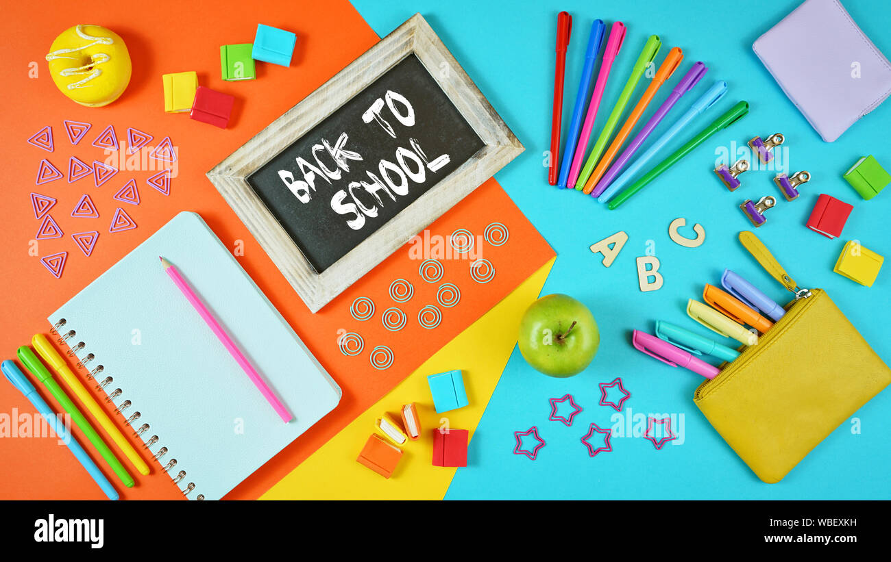 Back to school colorful kid's theme concept flat lay with blackboard ...
