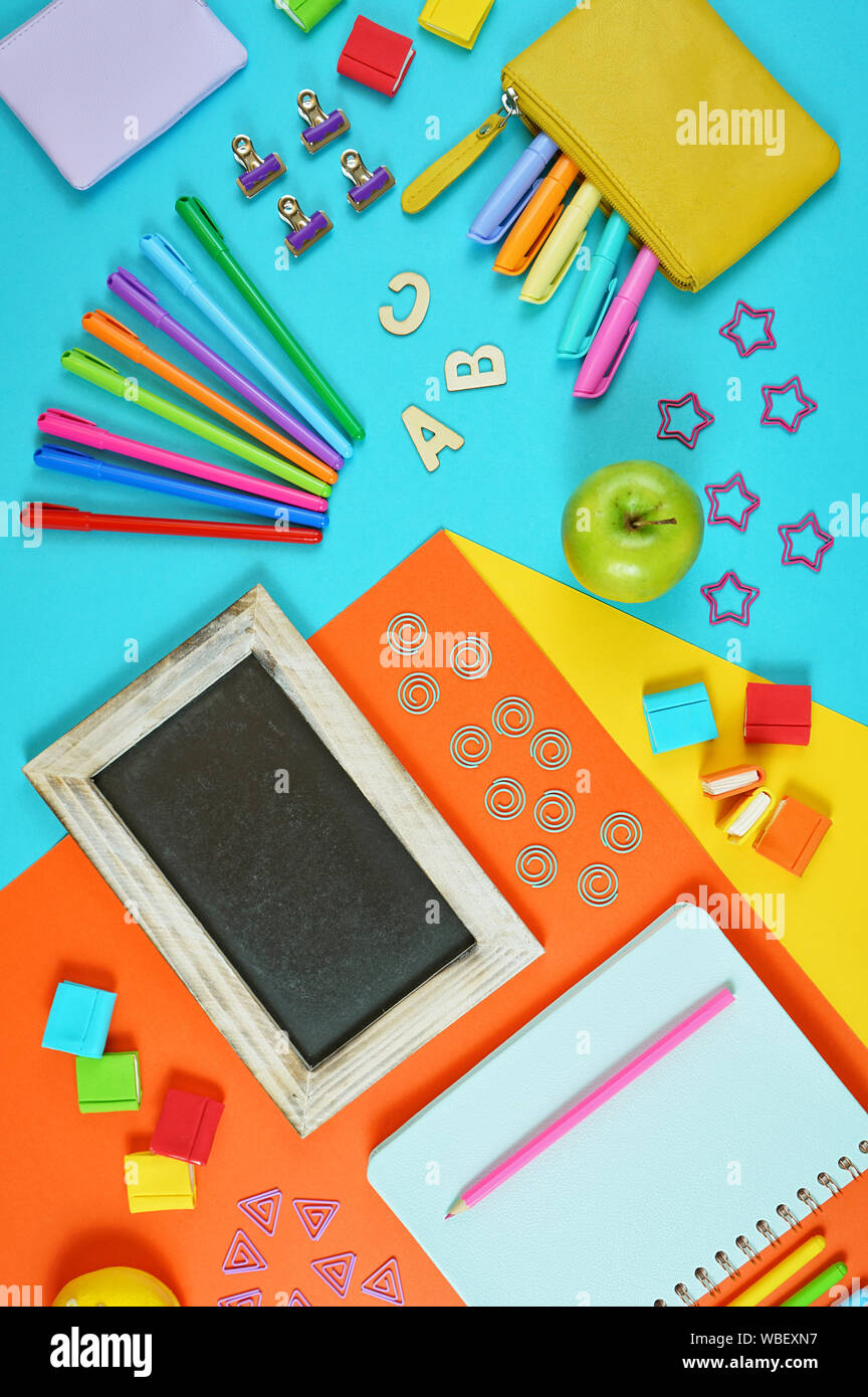 Back to school colorful kid's theme concept flat lay with blackboard ...