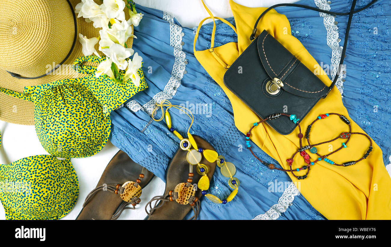 On-trend Boho Chic style fashion layout flat lay with blue and yellow ...