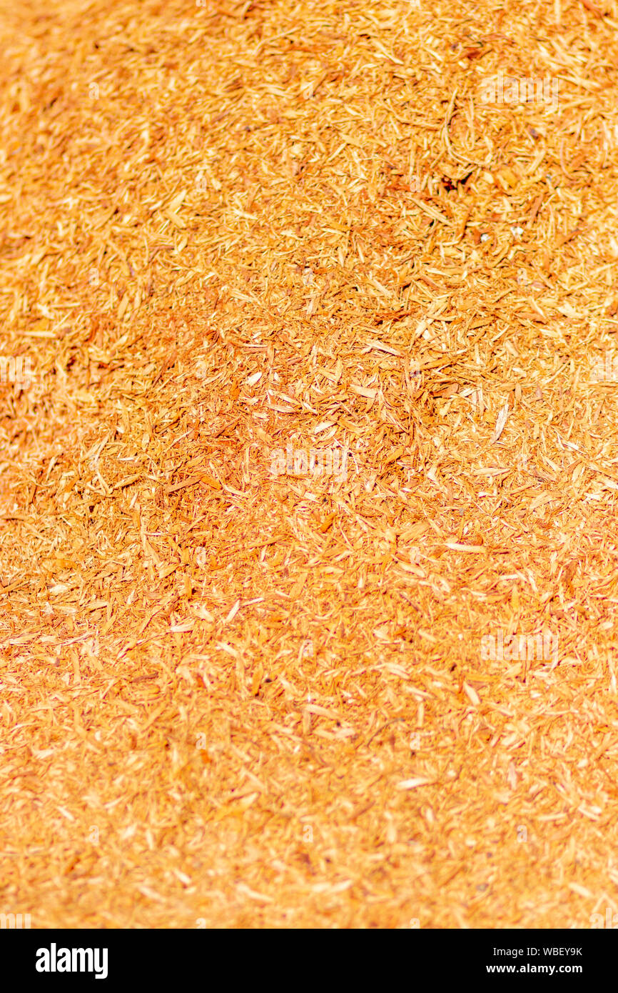 Sawdust or wood dust texture background Stock Photo - Alamy
