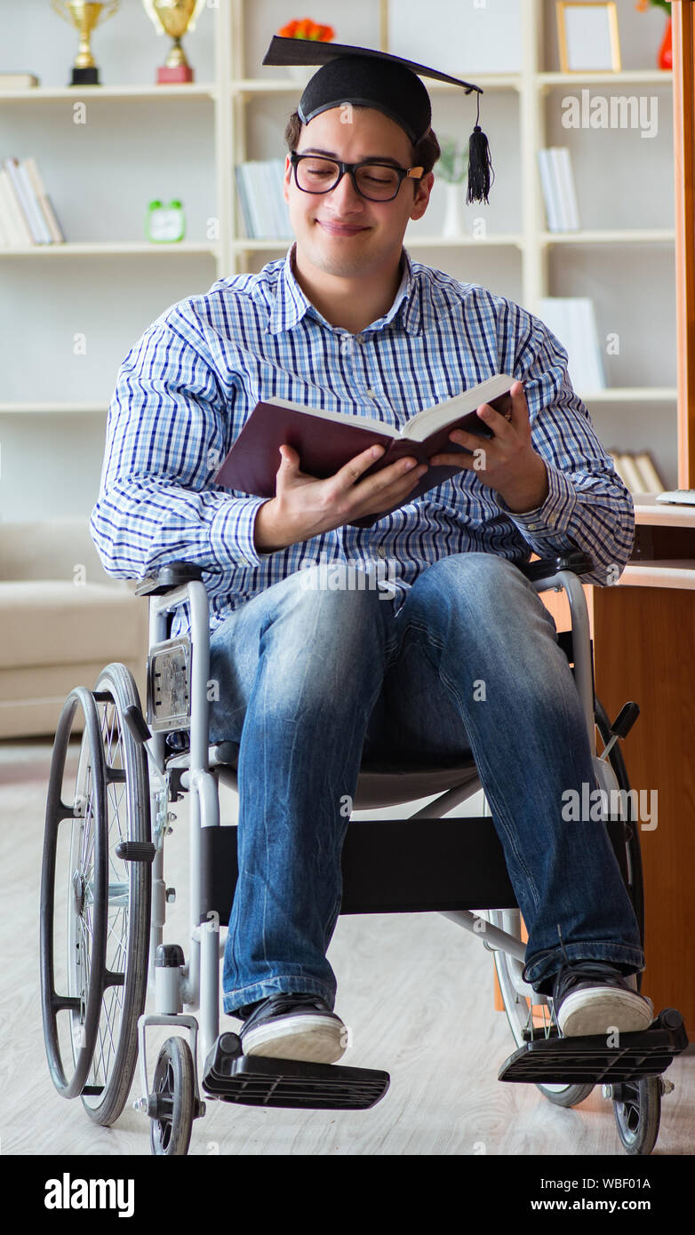 The disabled student studying at home on wheelchair Stock Photo - Alamy